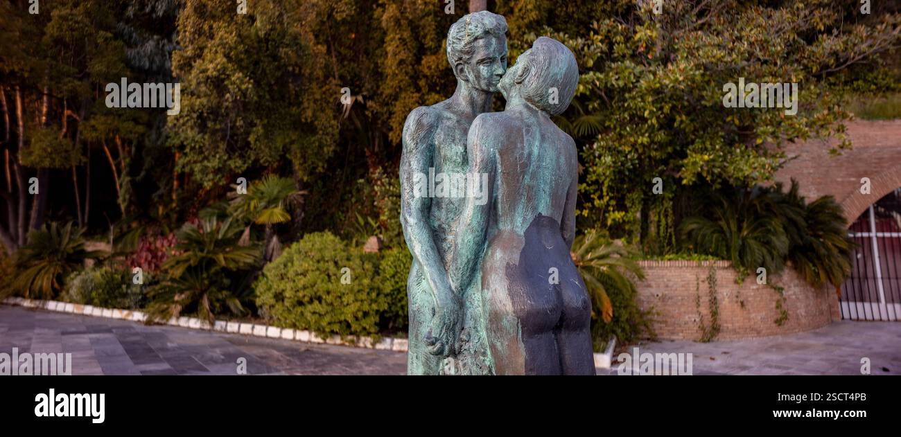 Bronze sculpture statue in public square depicting intimacy of male and ...