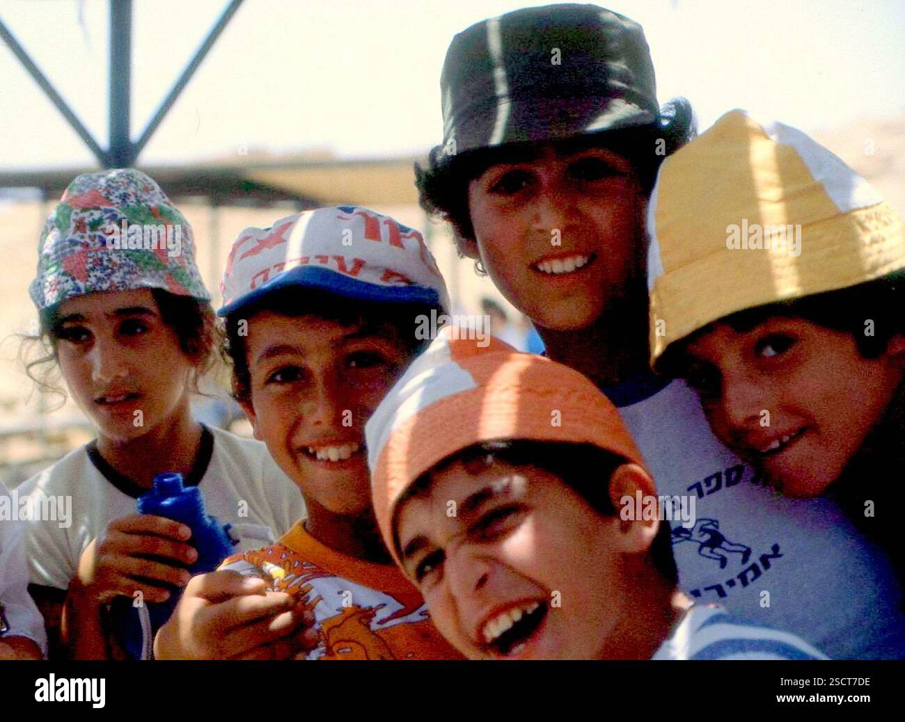 5 Israeli children laughing into the camera. Presumably during a ...