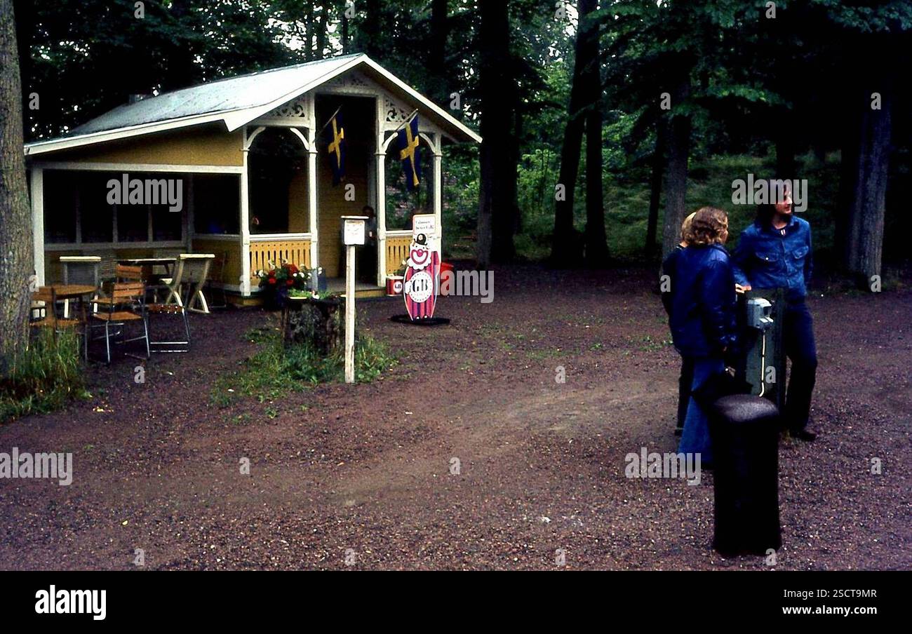 Rainy summer day in Linköping/Sweden. A hut can be seen in the forest ...