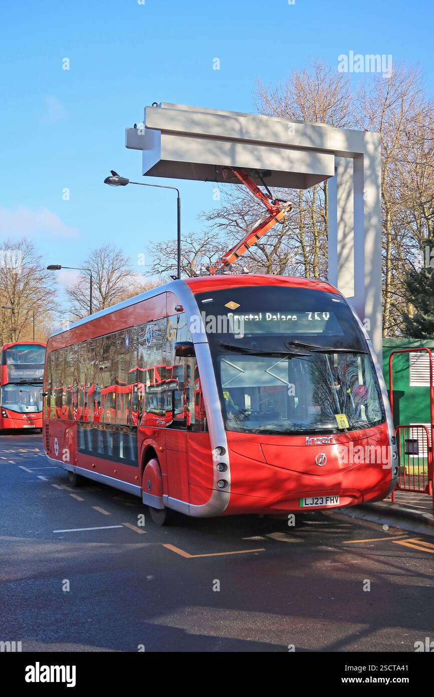 Crystal Palace, London, UK. New tram-style electric busses recharge ...