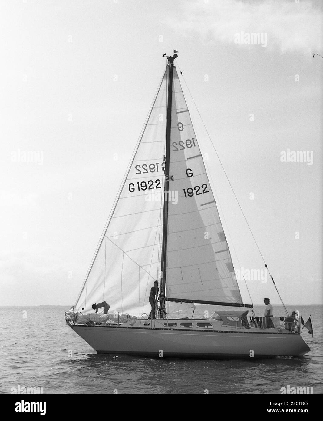 Sailing yacht off coast Black and White Stock Photos & Images - Alamy
