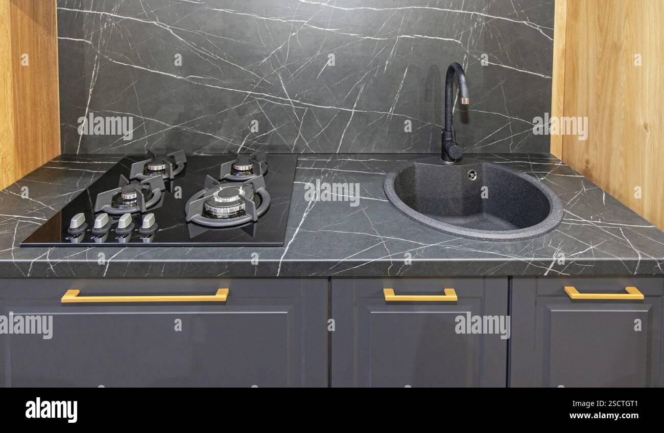 Gas Only Cooktop Stove and Round Sink at Marble Kitchen Counter Stock ...
