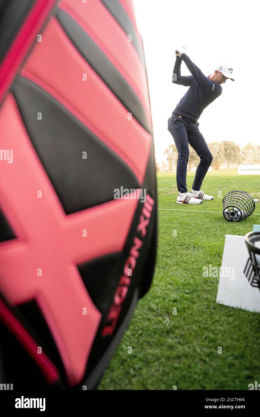 Tom McKibbin of Legion XIII hits his shot on the driving range before ...