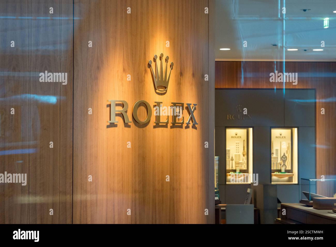 Elegant luxury watches showcased in a sophisticated retail environment ...