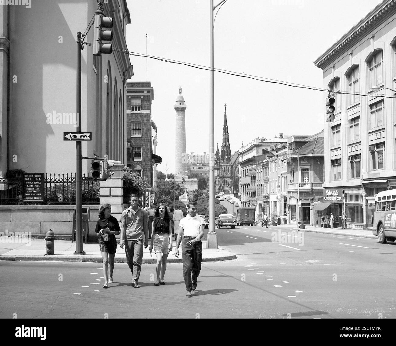 Downtown Baltimore: Picture shows a group of young people crossing a ...