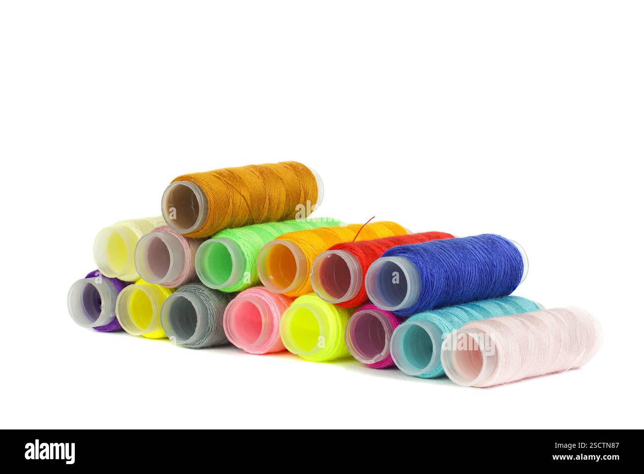 set of multi-colored sewing threads in coils, isolate on a white ...