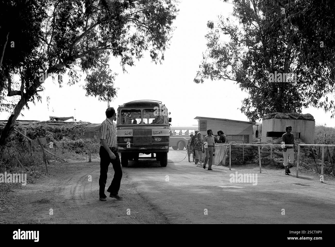 The border on the Jordan River between the West Bank and Jordan. A bus ...
