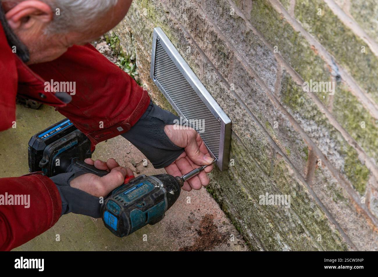 Screwing into brick wall hi-res stock photography and images - Alamy