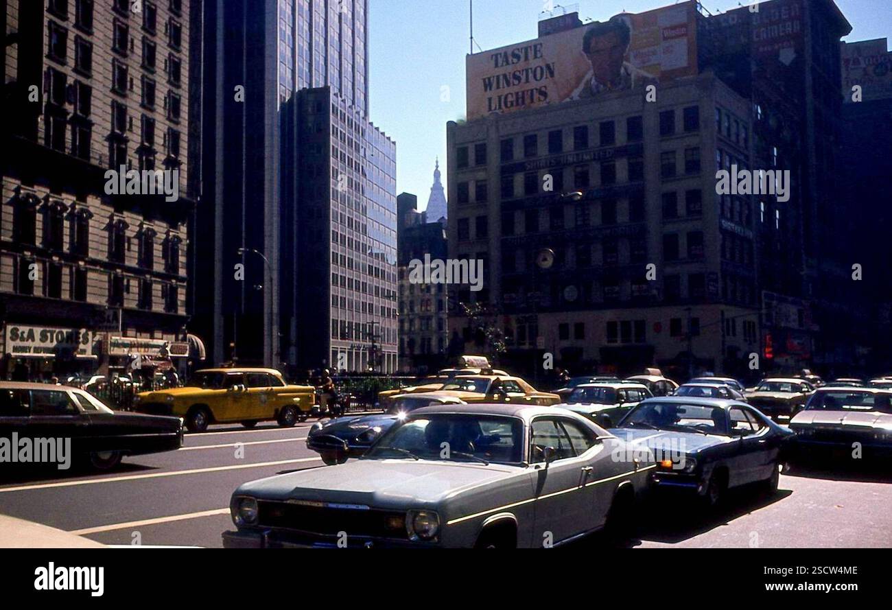 Cars, houses and advertising (Winston Lights button) in New York ...