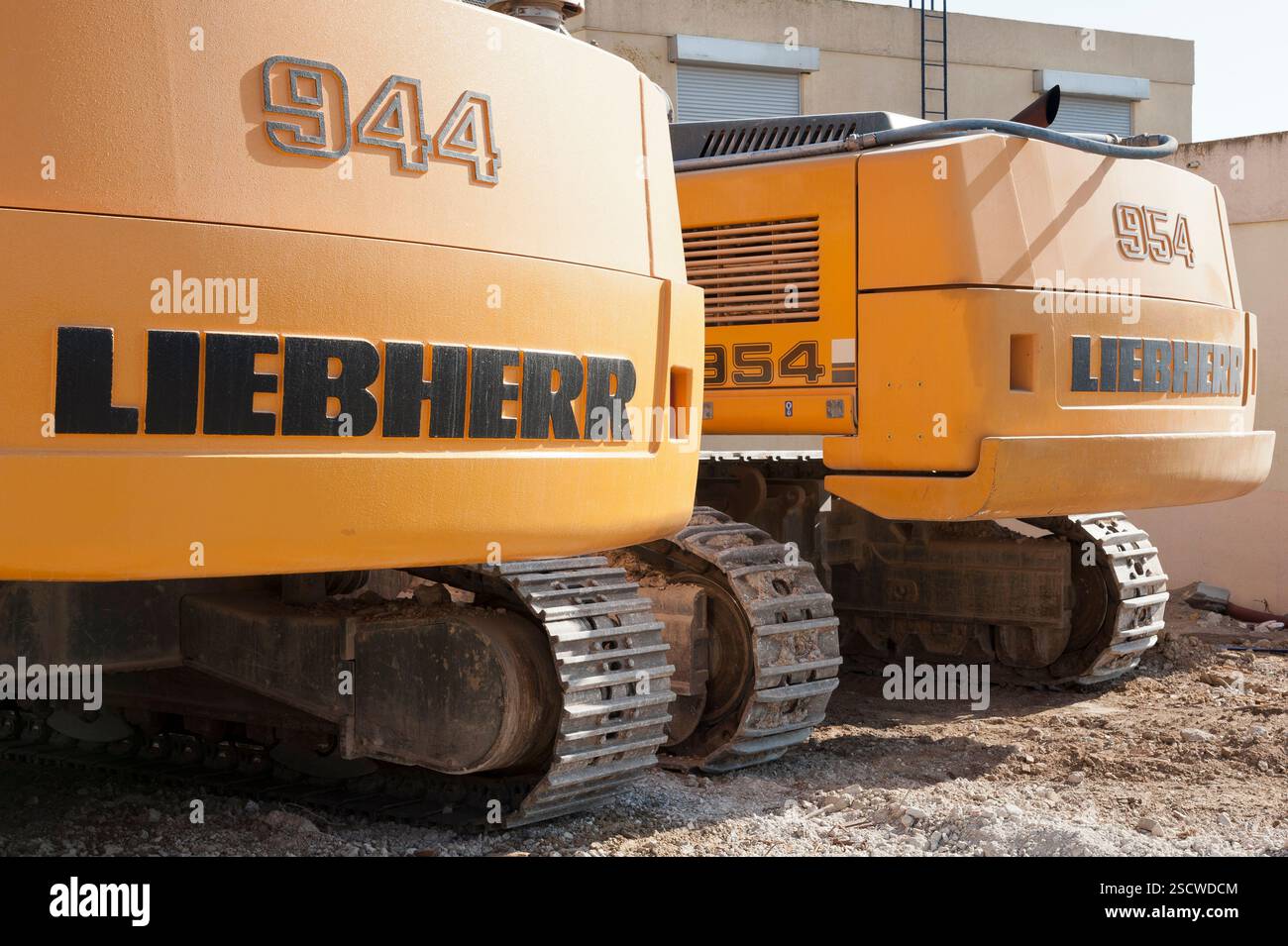 Two Liebherr mechanical excavators No. 954 and 944, close-up view from ...