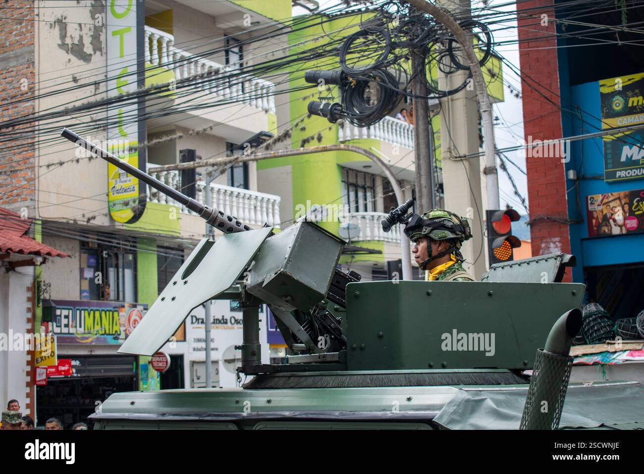 Soldiers in military vehicle with mounted machine gun, military forces ...