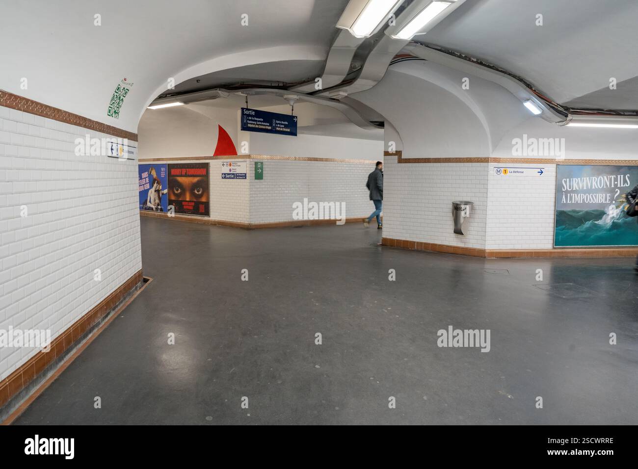 Urban exploration in an underground subway station with artistic ...