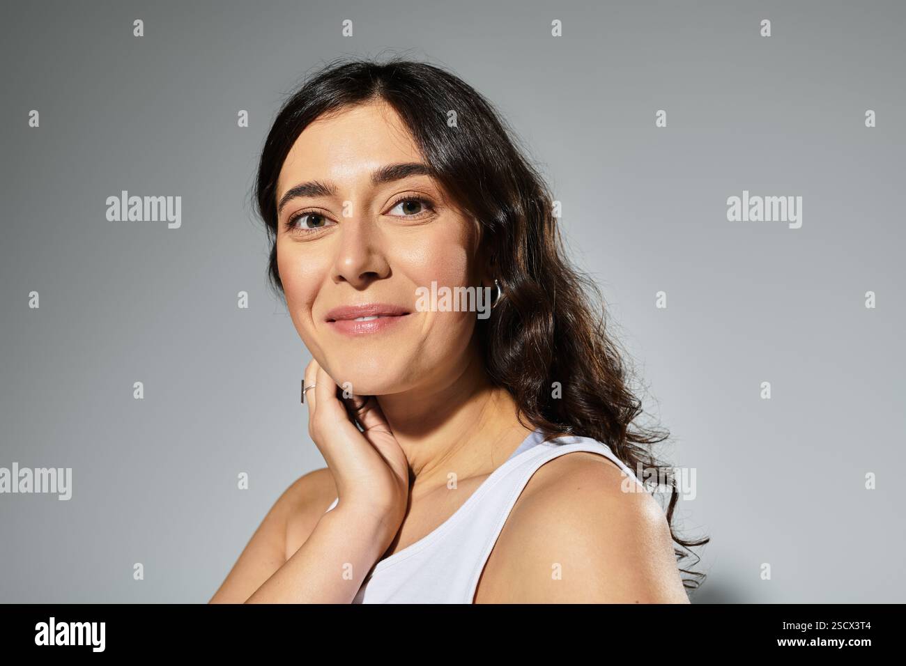 Capturing beauty and confidence of a plus size woman in a studio ...