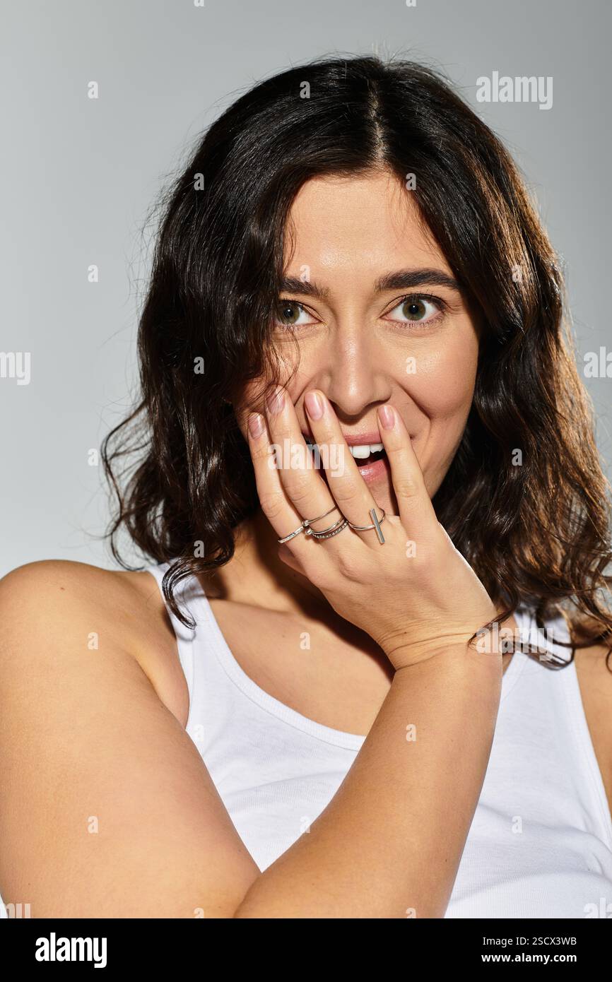 Celebrating beauty and confidence in a studio setting with a joyful ...