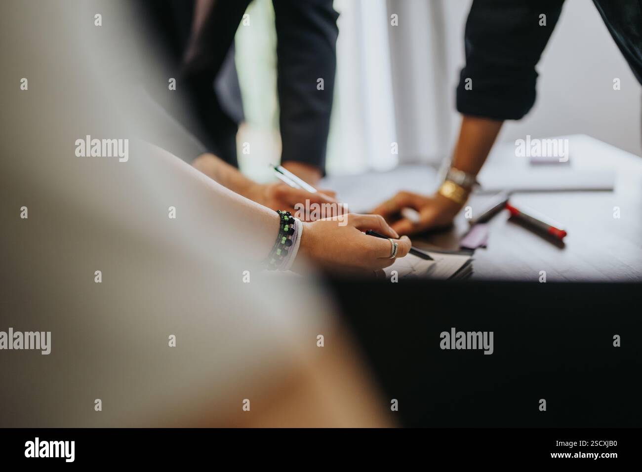 Students collaborating on school tasks in a teamwork setting Stock ...