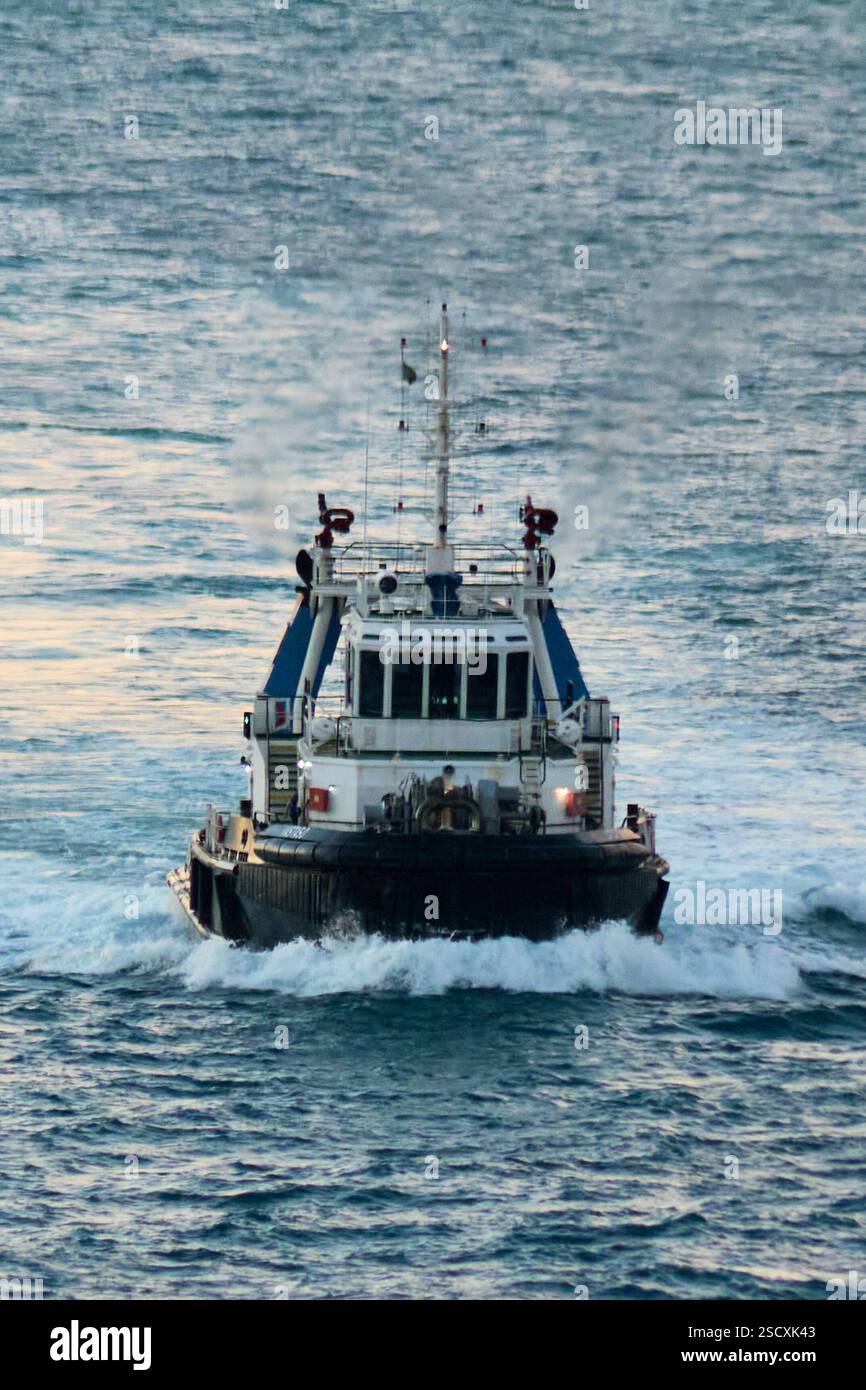 Civitavecchia, Italy - February 7, 2025: Maritime pilot boat assisting ...