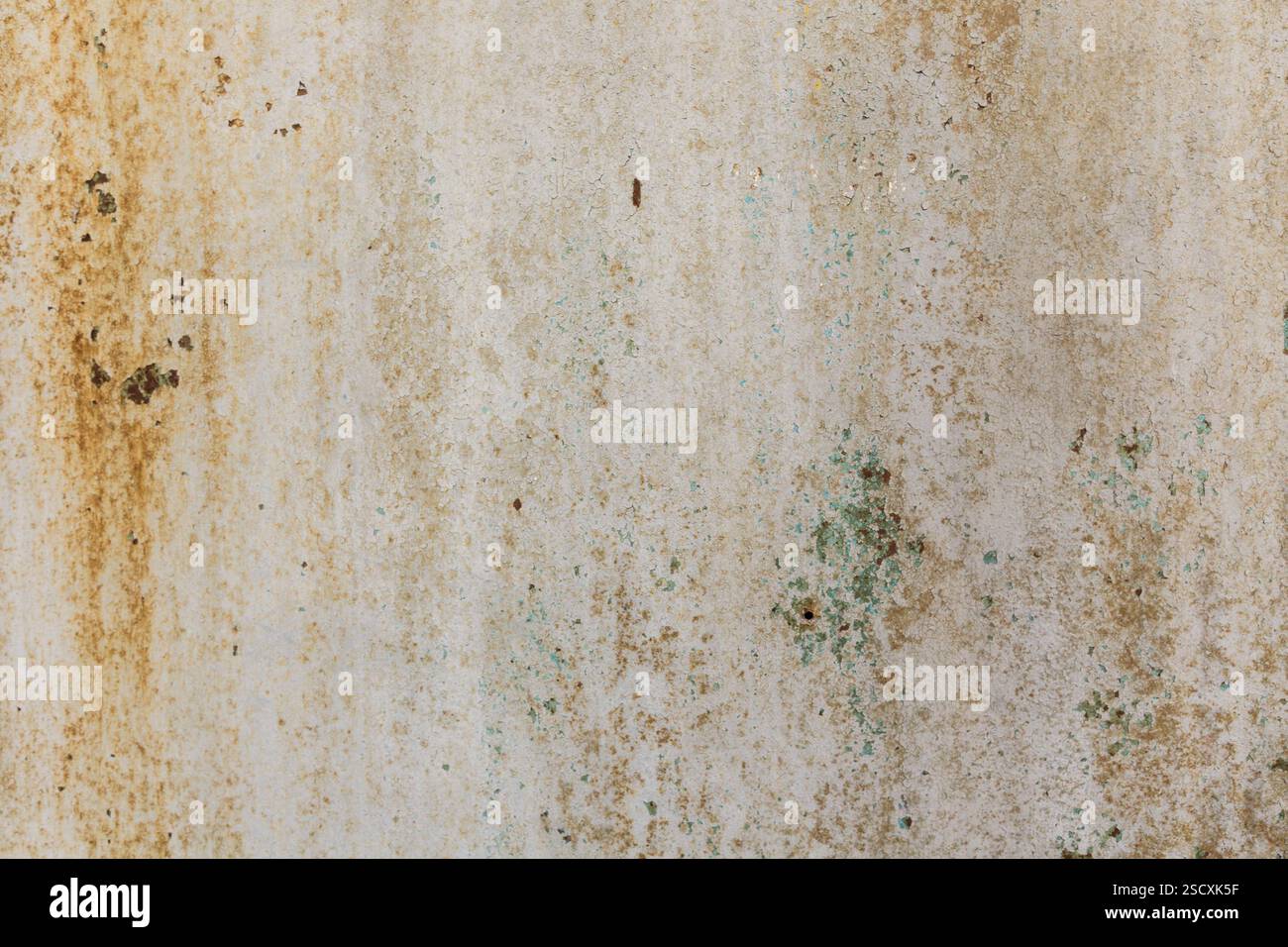 Weathered surface with rust stains and discoloration revealing age and ...