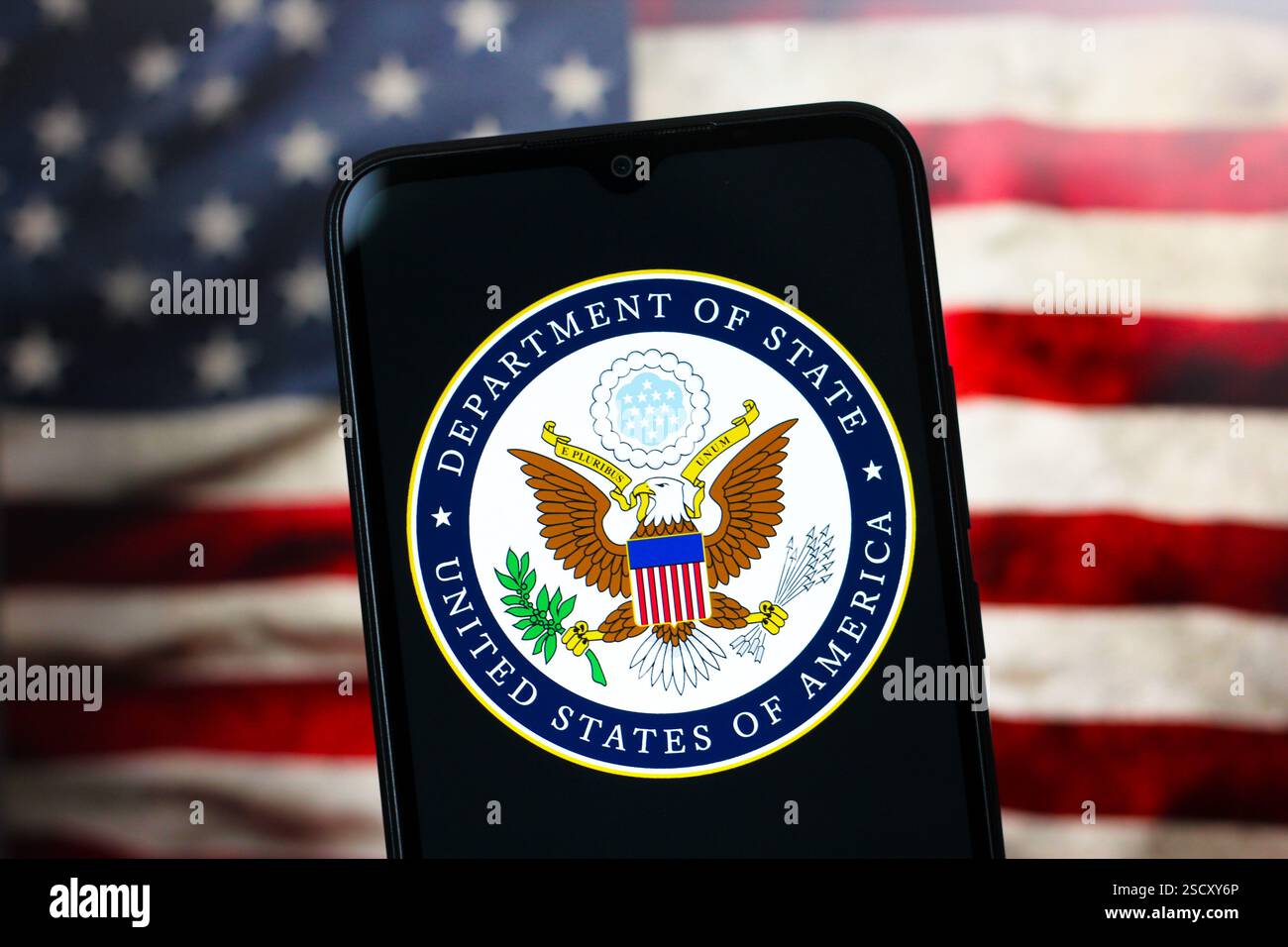 In this photo illustration, the United States Department of State (DOS ...