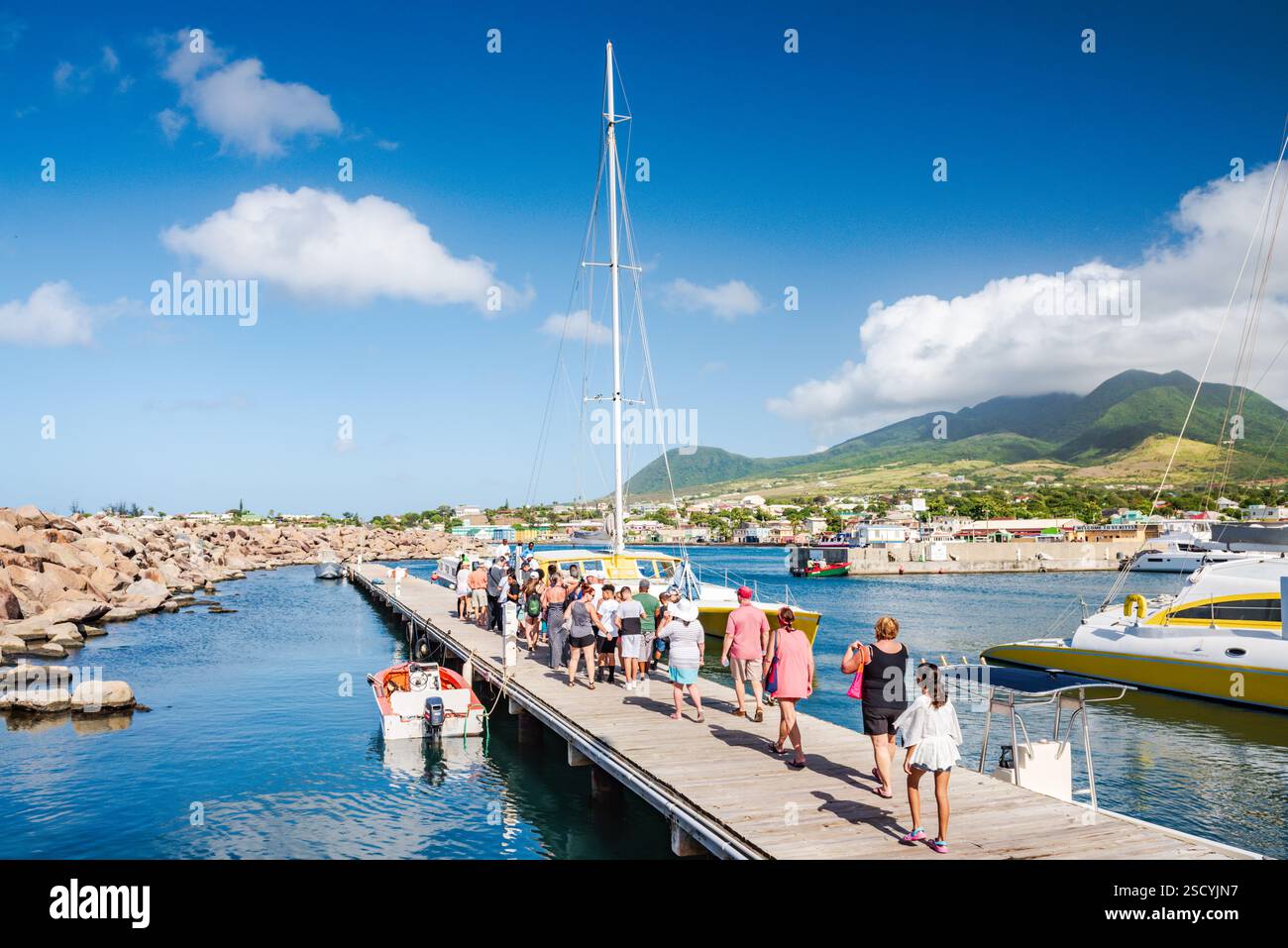 Basseterre, St. Kitts - August 22, 2018: Passengers boarding sailboat ...