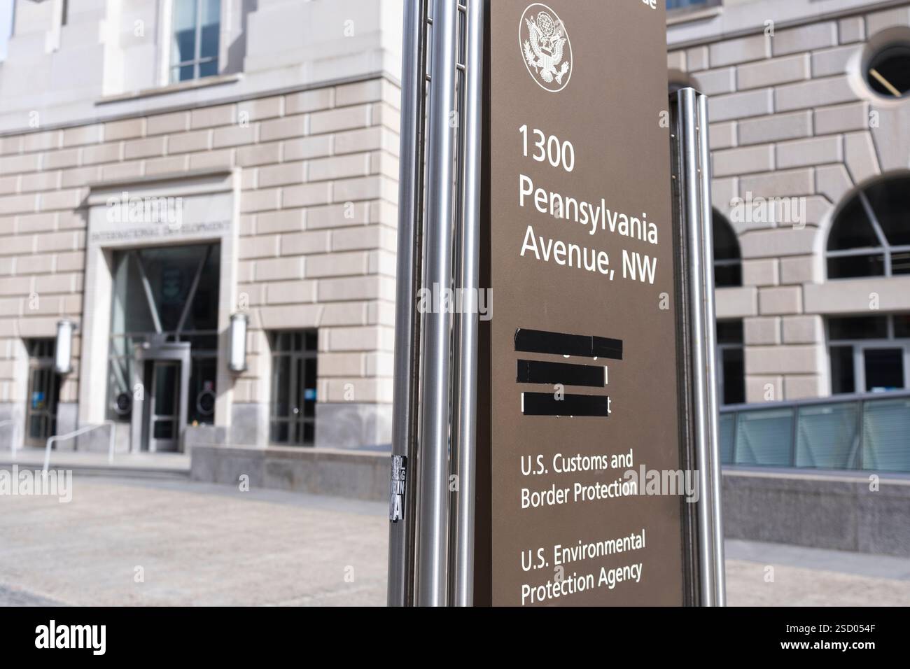 A street sign with names of U.S. government agencies housed at the ...
