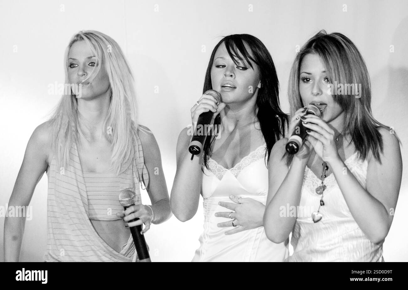 GIRLS ALOUD, CONCERT, 2005: (L-R) Sarah Harding, Kimberley Walsh and ...