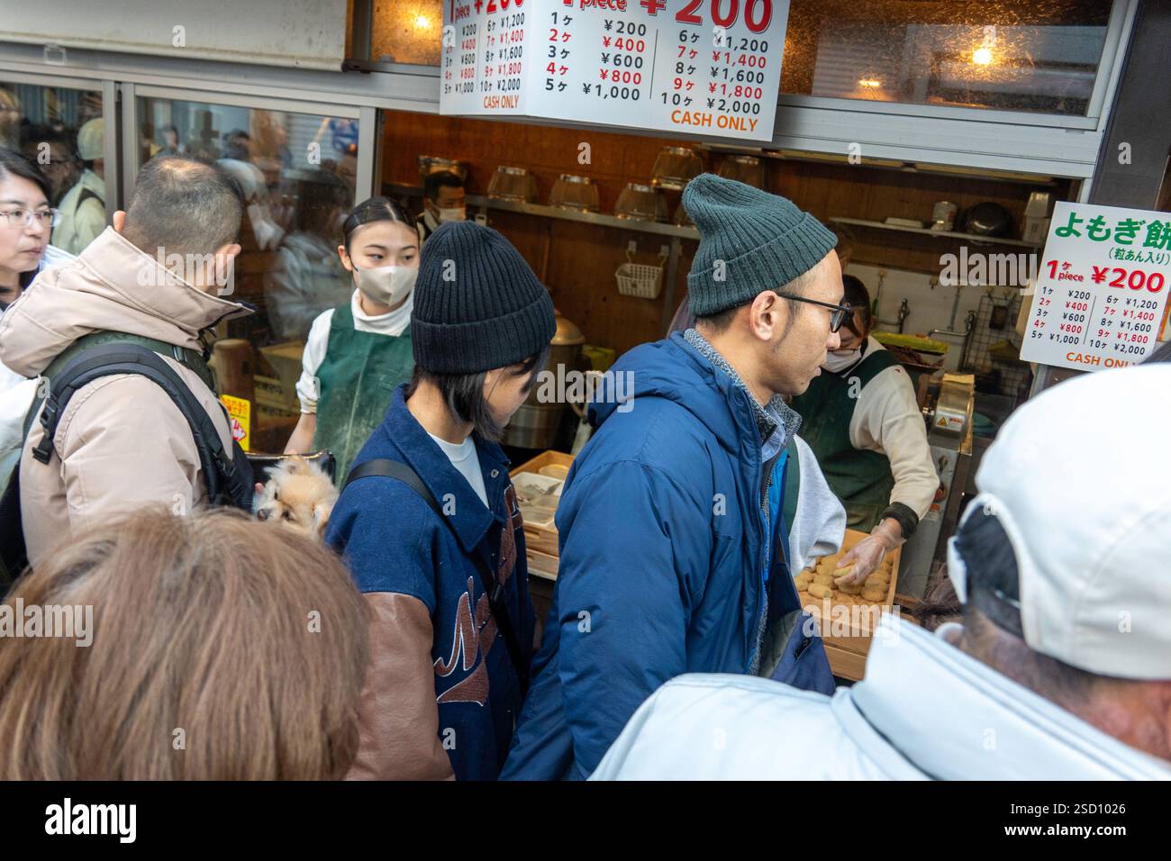 Kyoto, Japan - Dec 27 2024: Crowds gather at bustling street market in ...