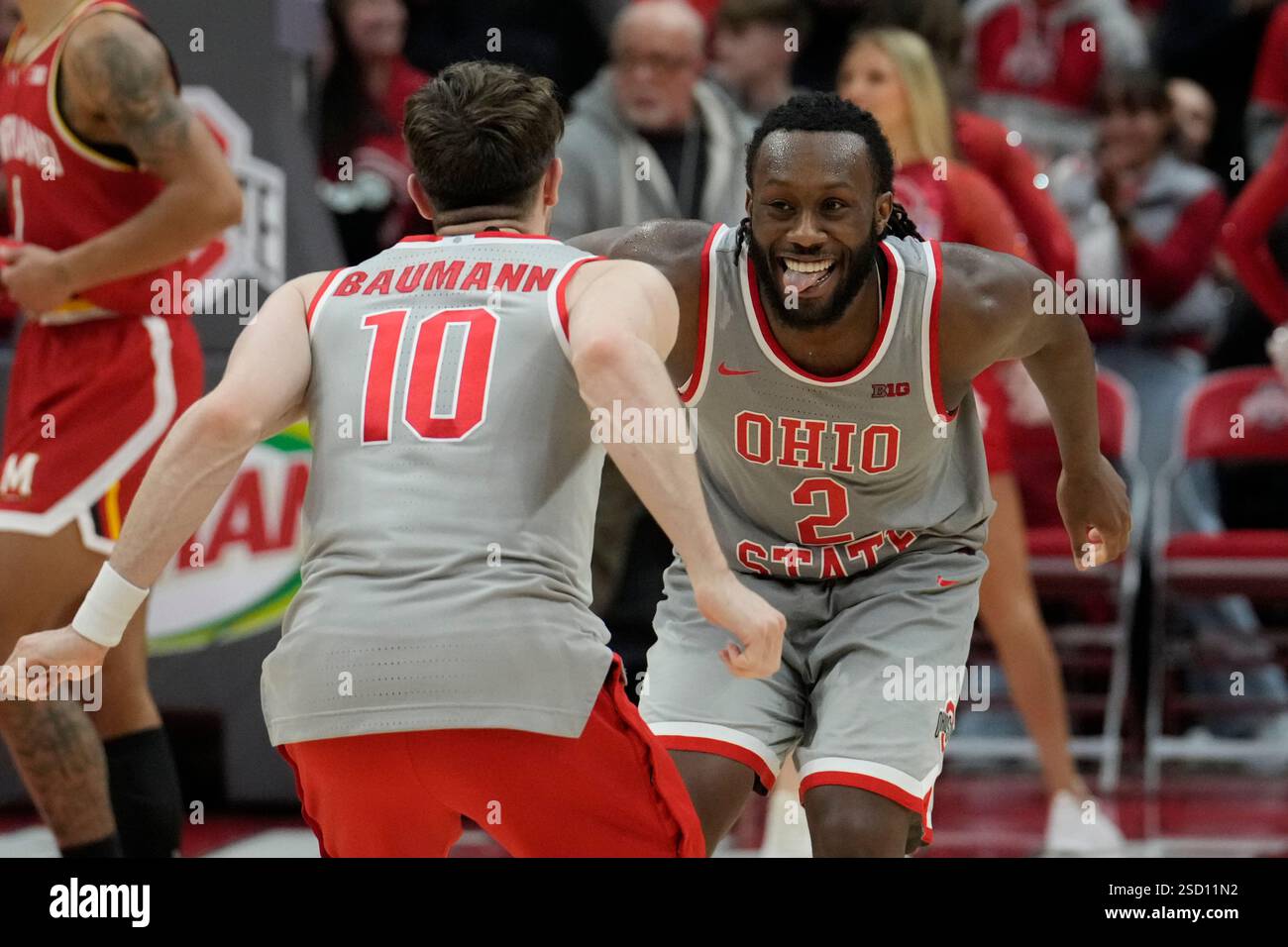 Ohio State guard Bruce Thornton (2) celebrates with teammate Colby ...