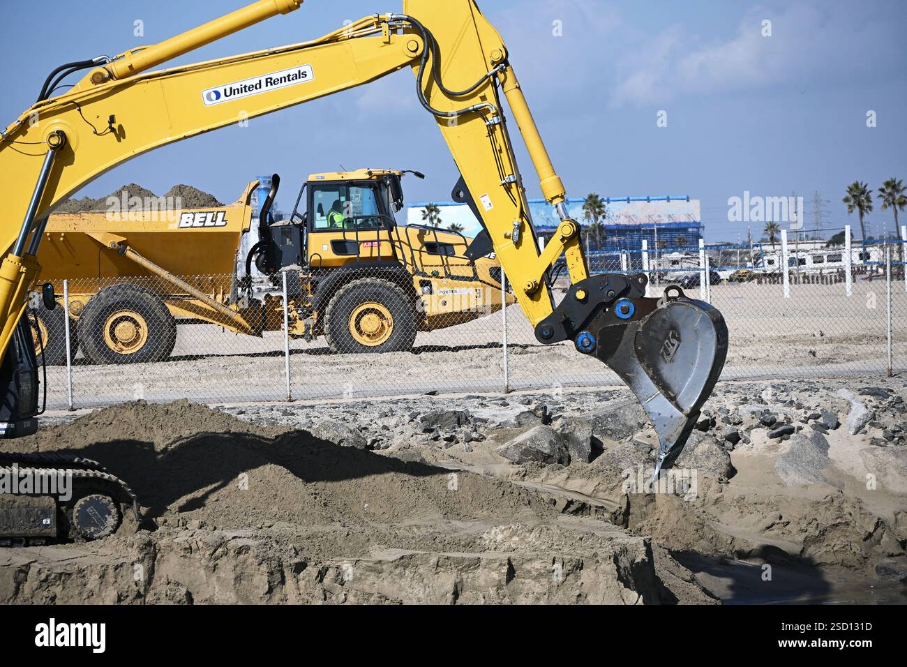 HUNTINGTON BEACH, CALIFORNIA: 29 JAN 2025: Workers Dredging the mouth ...