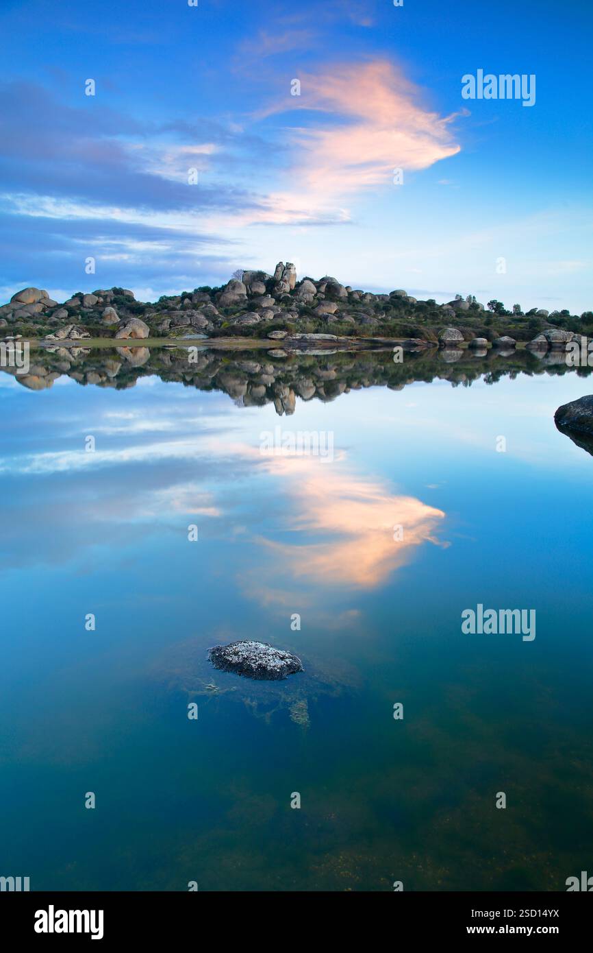 A natural setting where granite rocks and pools of water that are home ...