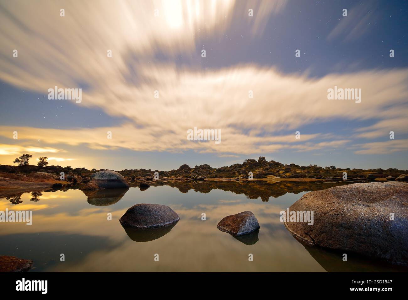 A natural setting where granite rocks and pools of water that are home ...