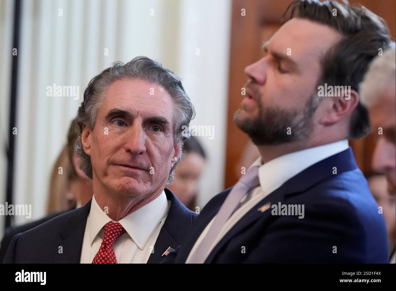 Vice President JD Vance, right, talks with Secretary of Interior Doug ...
