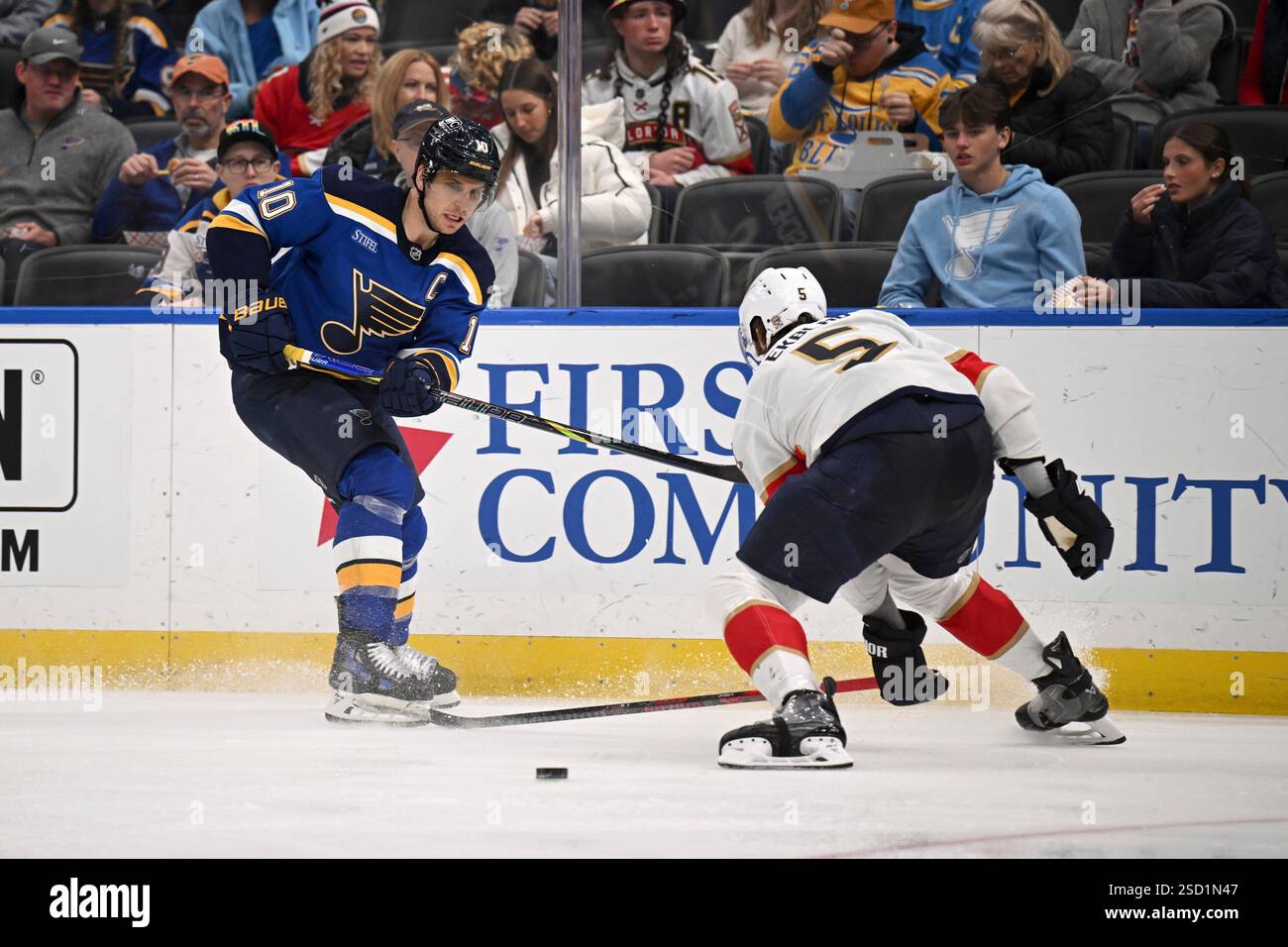 St. Louis Blues' Brayden Schenn (10) passes the puck past Florida ...