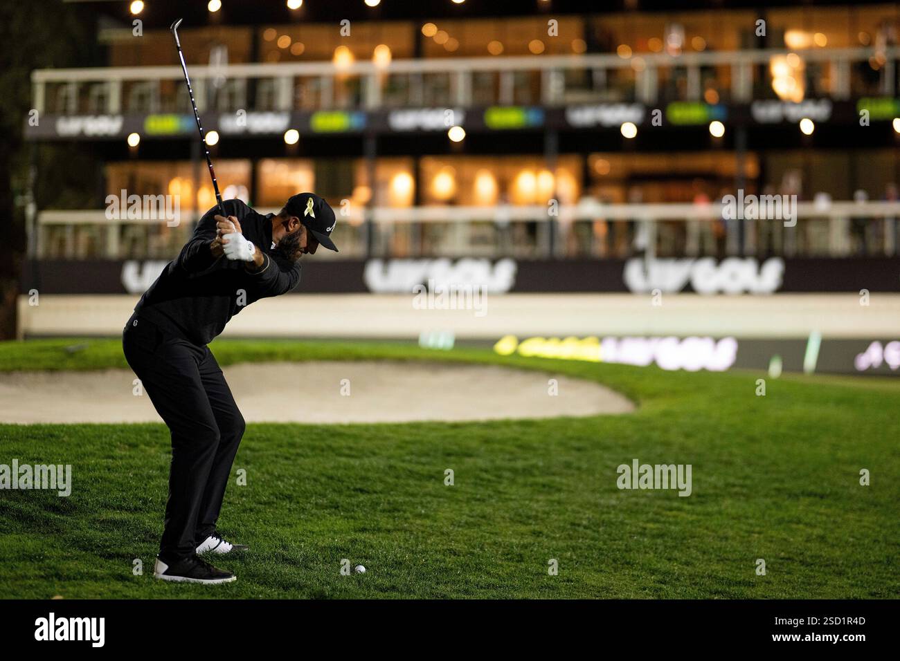 Captain Dustin Johnson of 4Aces GC hits his shot from the fairway on ...
