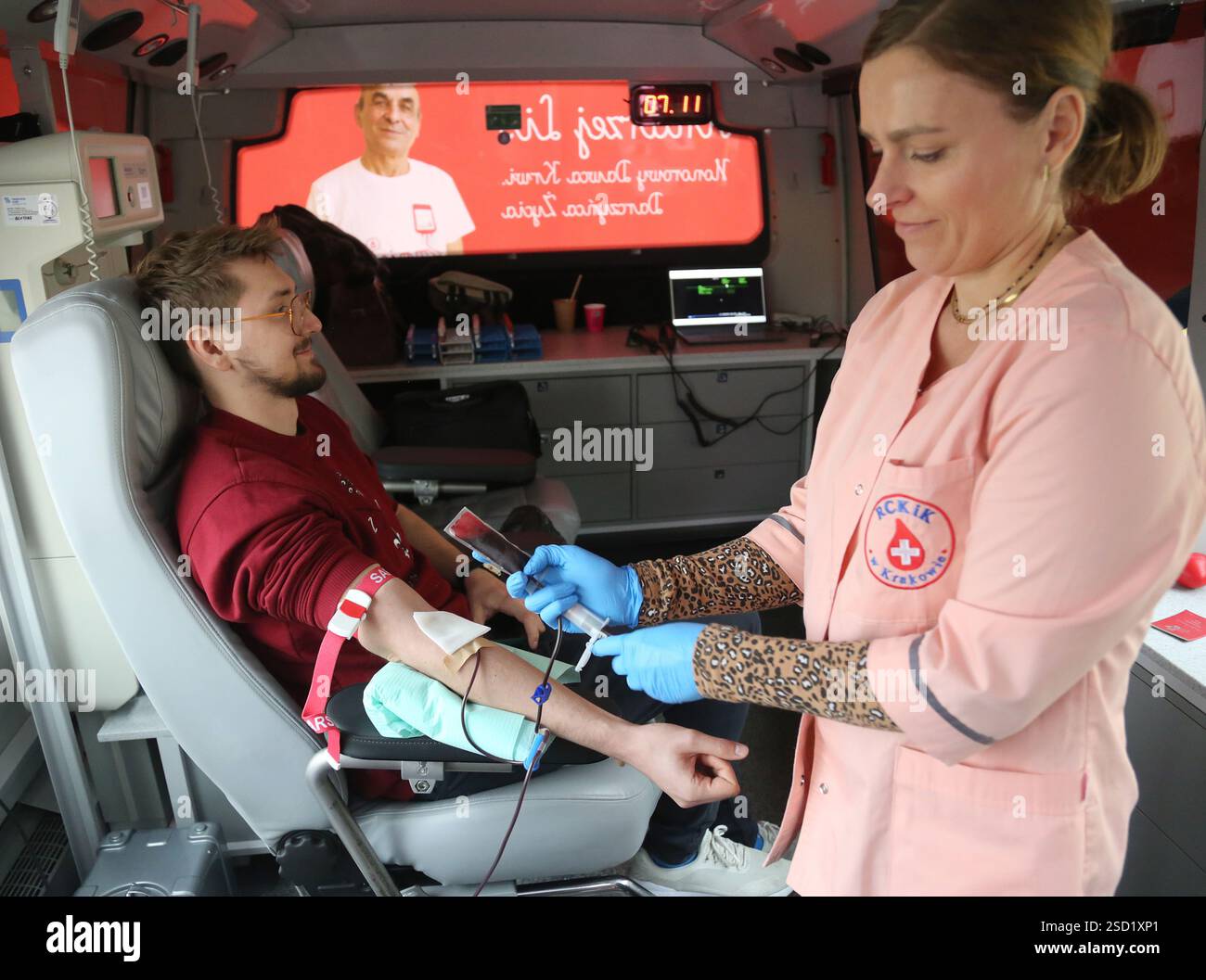 Cracow. Krakow. Poland. Donating the blood in mobile blood donation ...