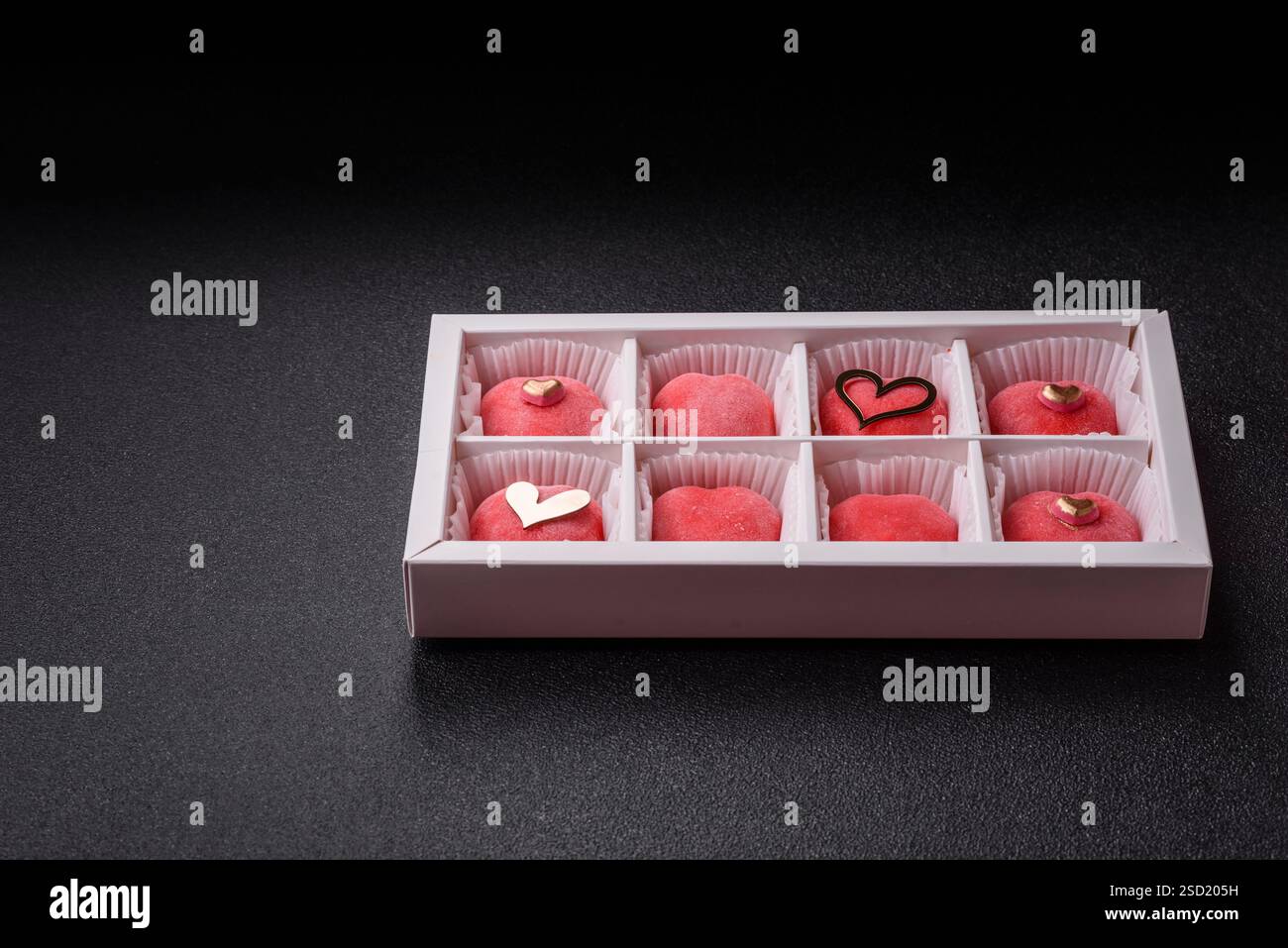 Delicious sweet mochi in the shape of red hearts for the holiday of ...