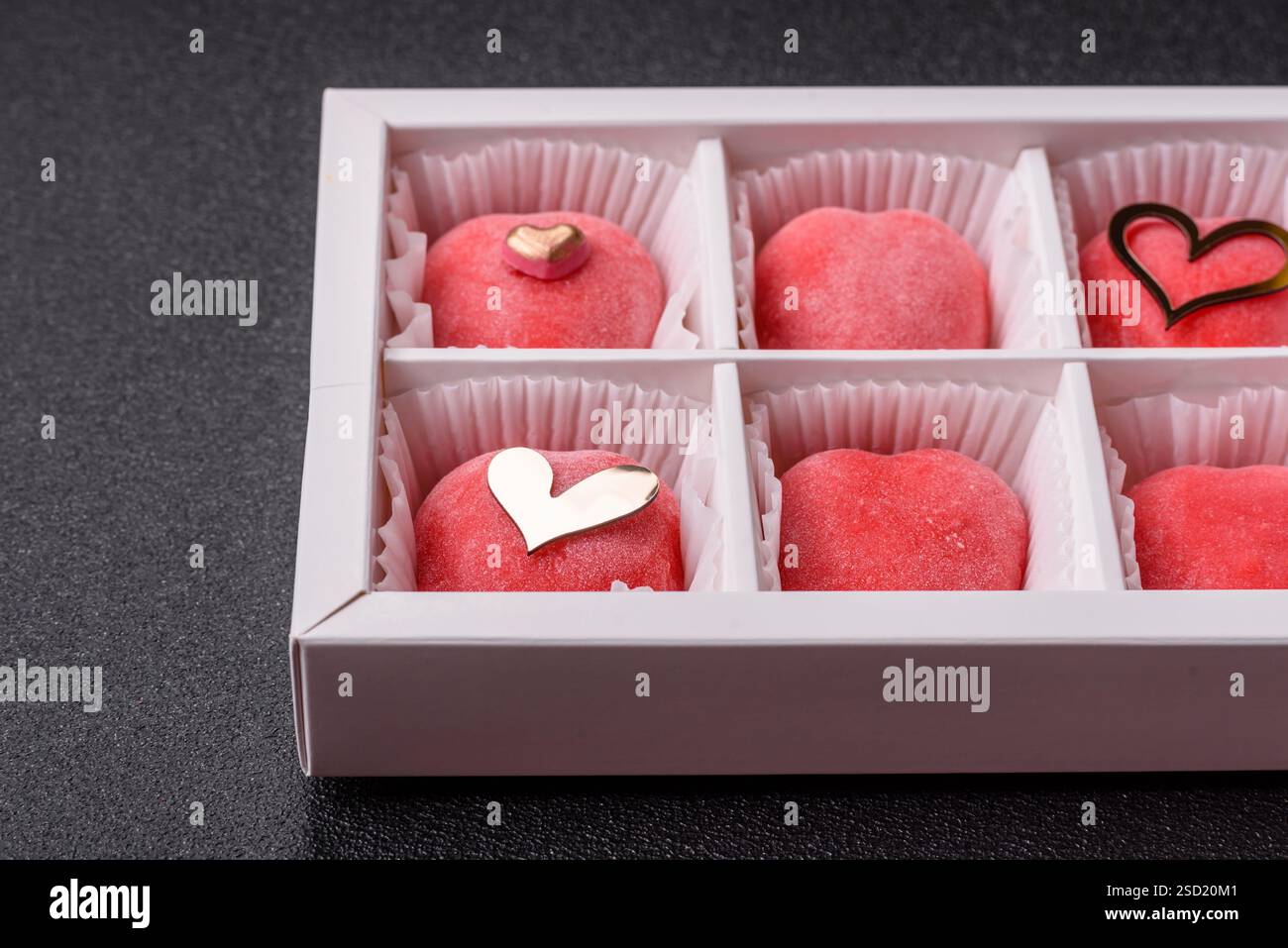 Delicious sweet mochi in the shape of red hearts for the holiday of ...