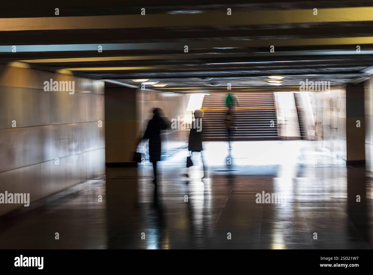 Conceptual, black and white shot of the exit from underground ...