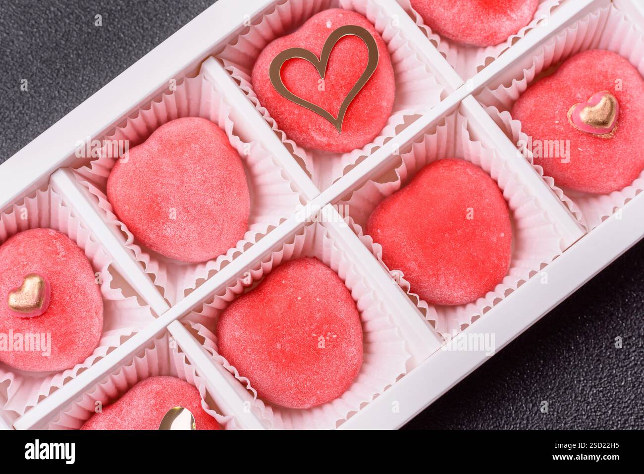 Delicious sweet mochi in the shape of red hearts for the holiday of ...