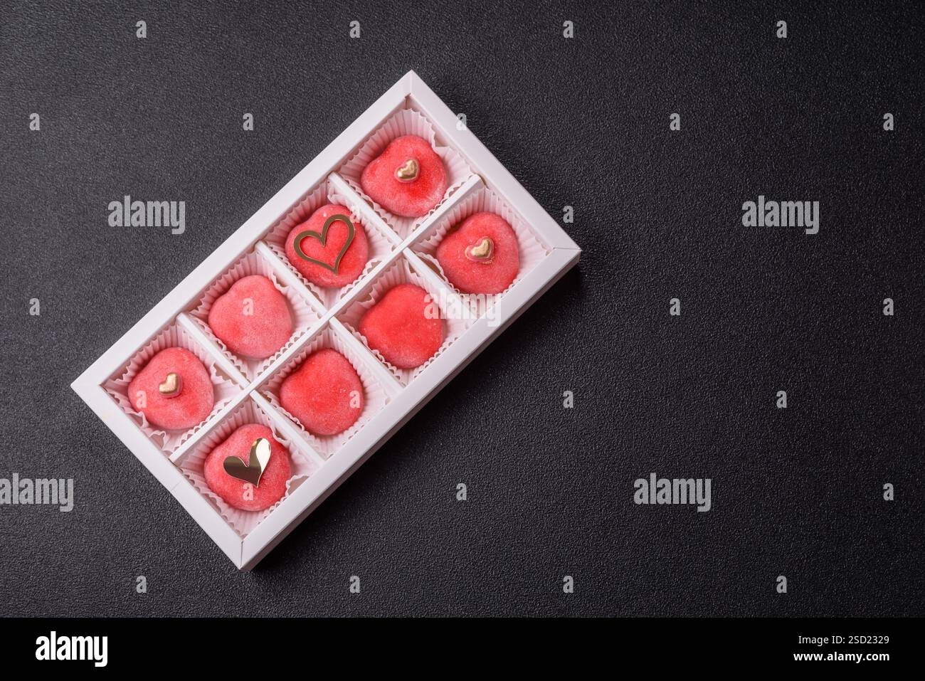 Delicious sweet mochi in the shape of red hearts for the holiday of ...