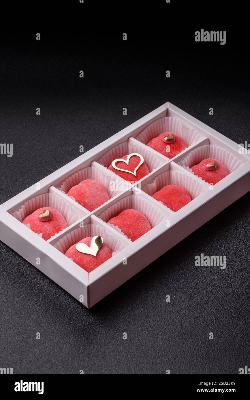 Delicious sweet mochi in the shape of red hearts for the holiday of ...