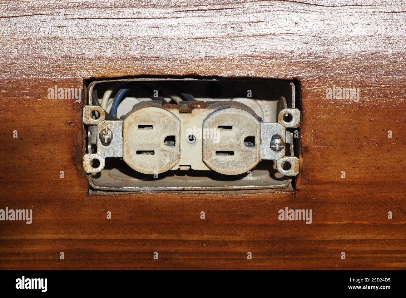 Electrical outlet embedded in wooden house Stock Photo - Alamy
