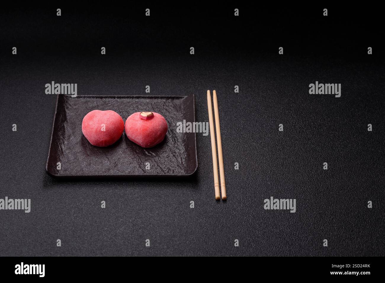 Delicious sweet mochi in the shape of red hearts for the holiday of ...