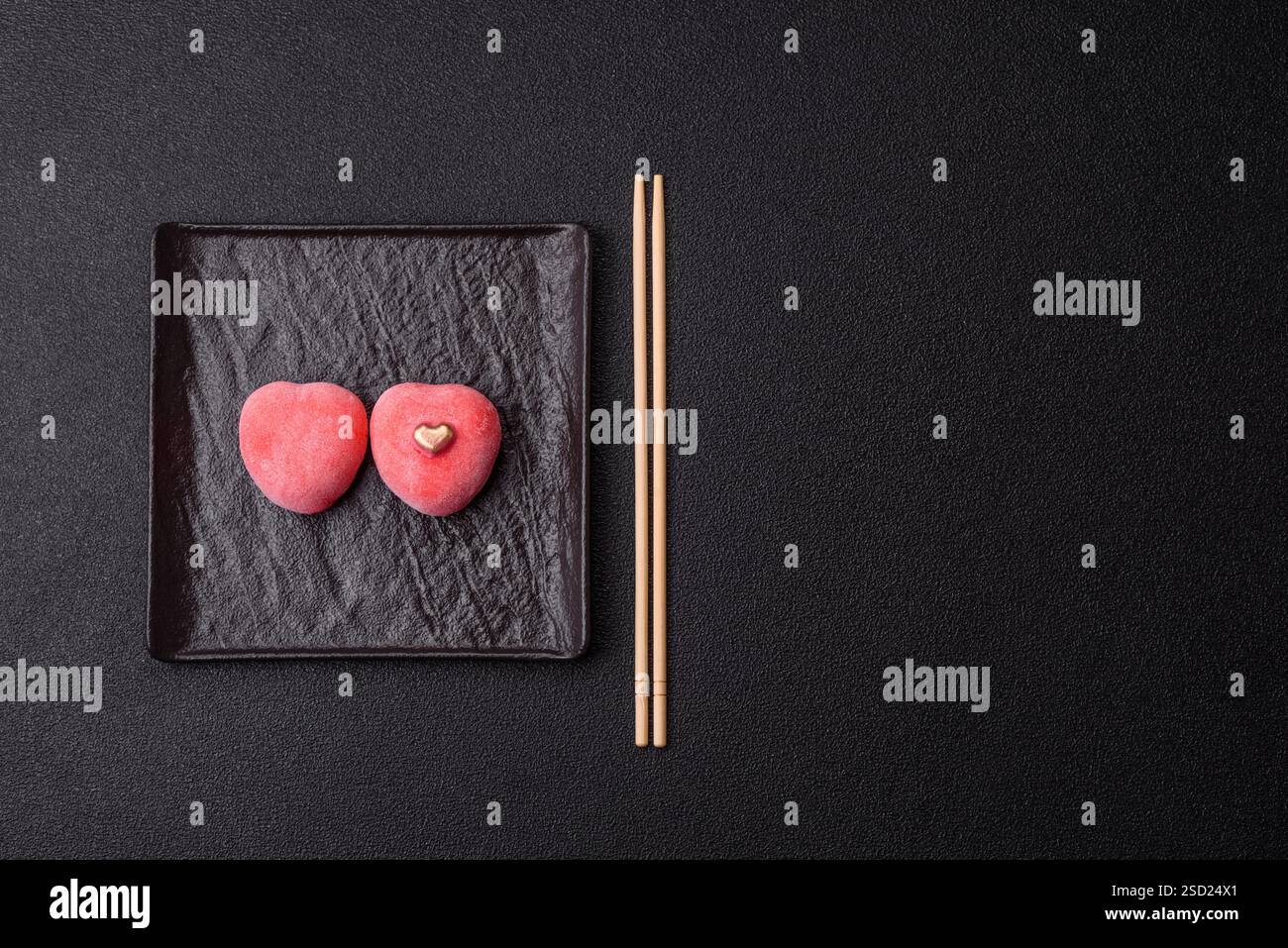 Delicious sweet mochi in the shape of red hearts for the holiday of ...