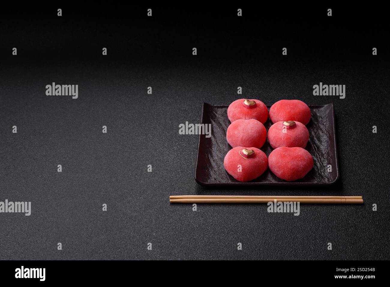 Delicious sweet mochi in the shape of red hearts for the holiday of ...