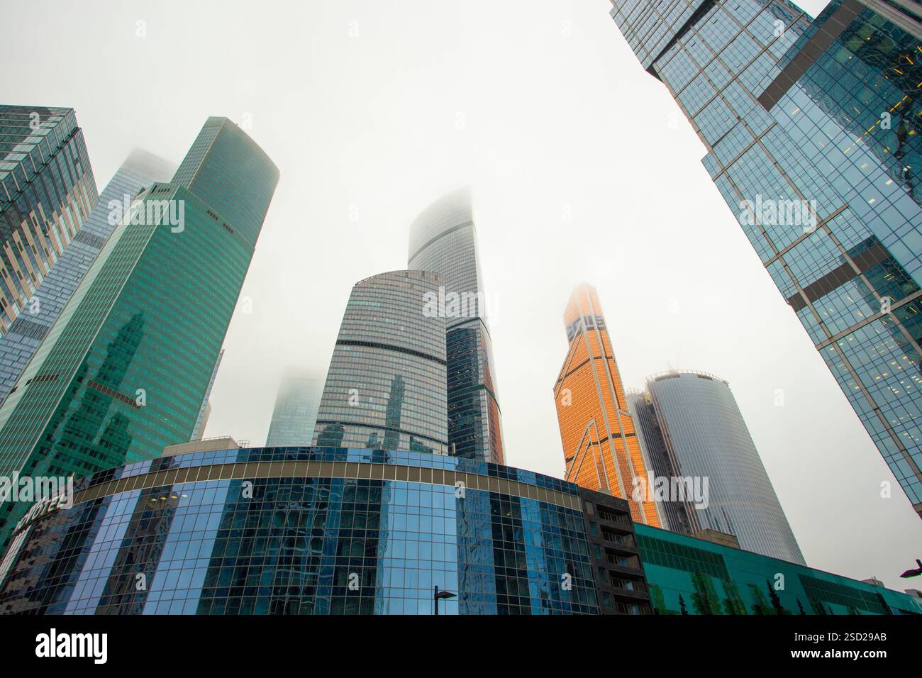 Russia, Moscow, September 28, 2022, High-rise buildings in the fog in ...
