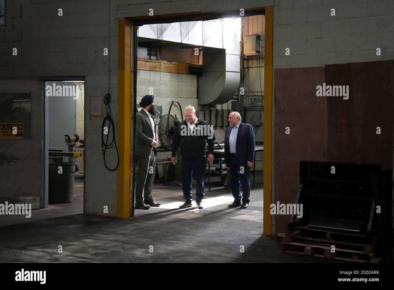 Ontario PC Leader Doug Ford stands with Aris Babikan and Prabmeet ...