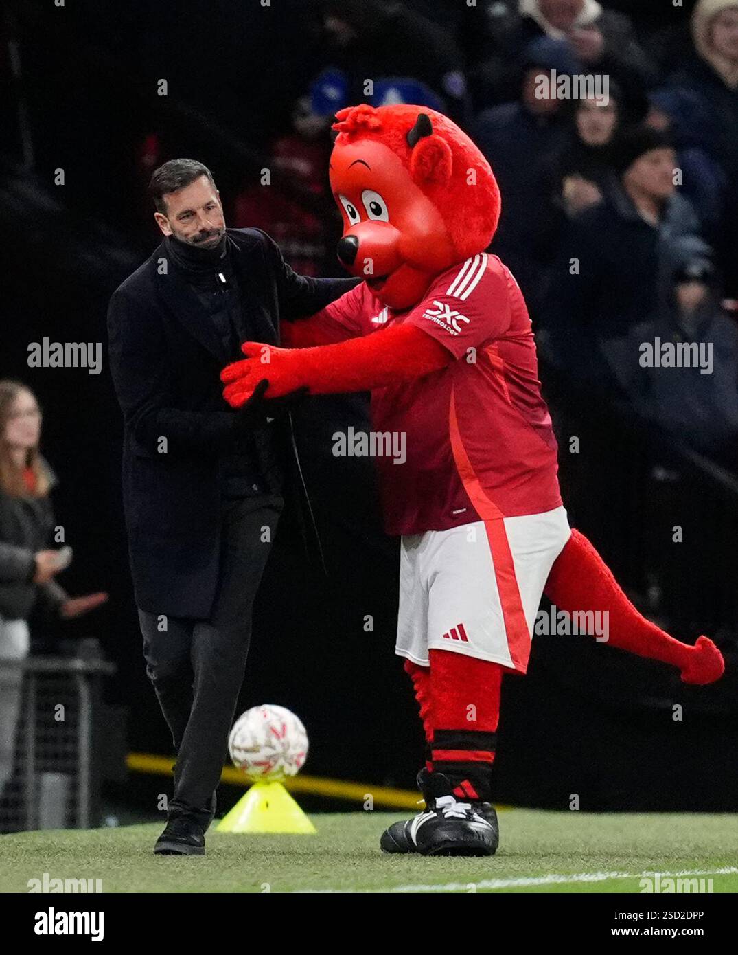 Leicester City manager Ruud van Nistelrooy is greeted by Manchester ...