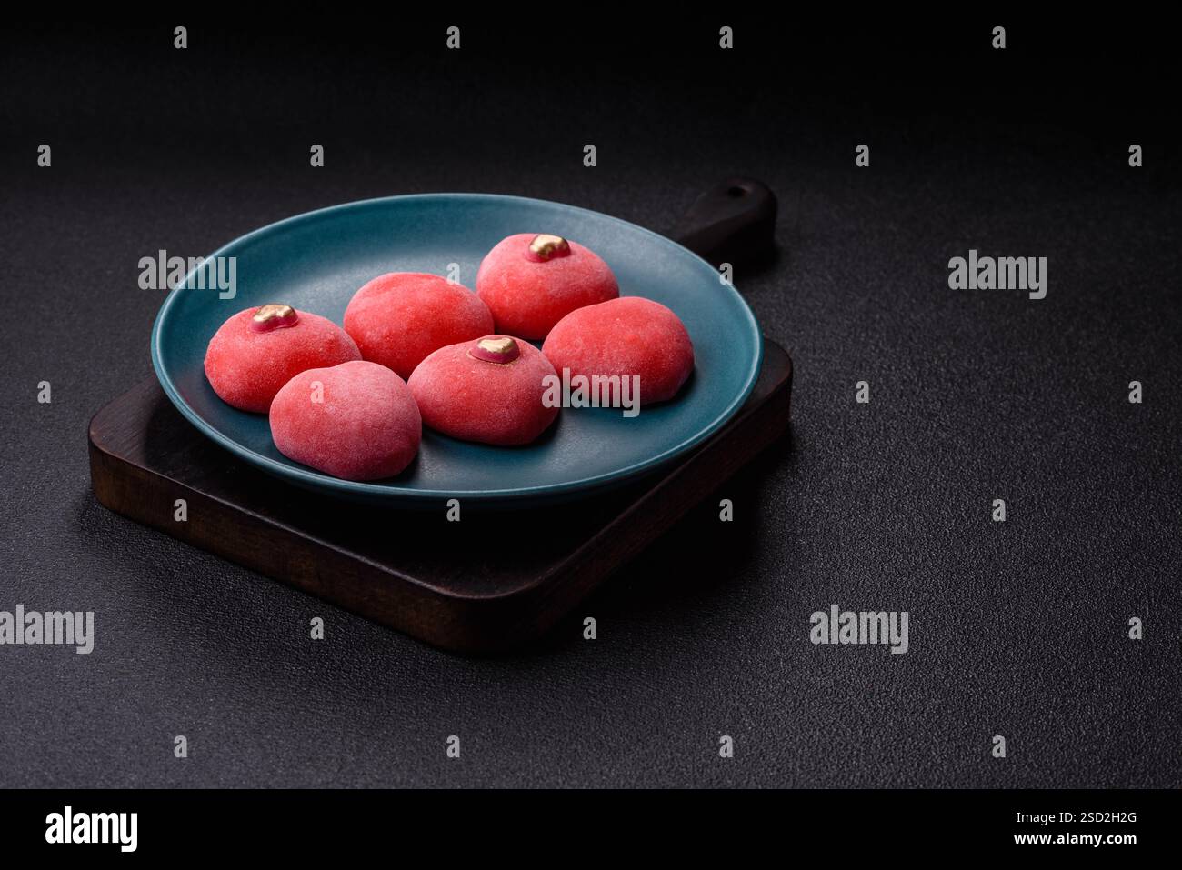 Delicious sweet mochi in the shape of red hearts for the holiday of ...