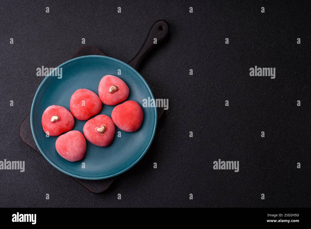 Delicious sweet mochi in the shape of red hearts for the holiday of ...