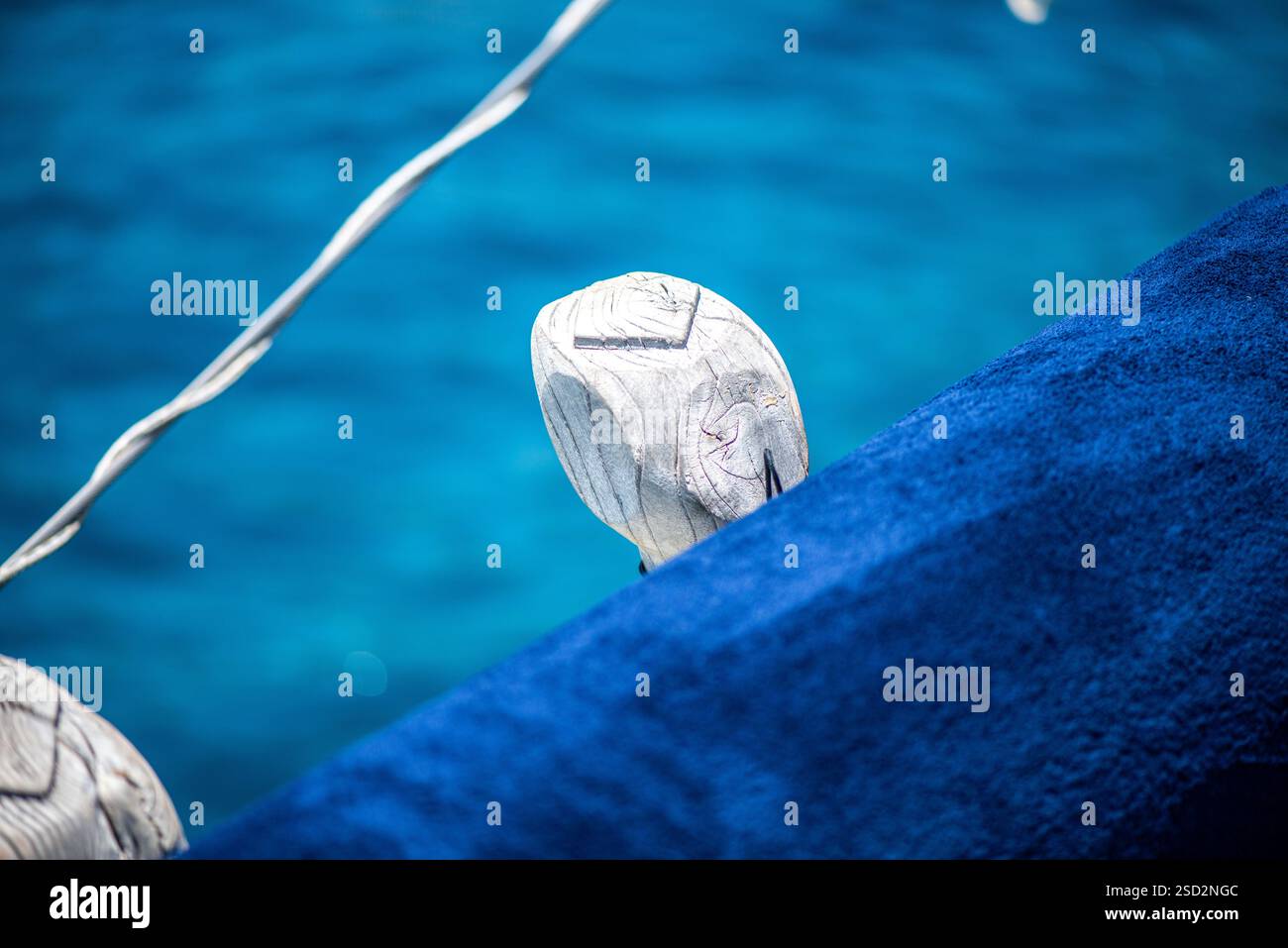 A detailed view of the essential components of a sail, including ropes ...